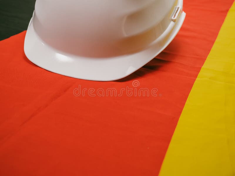 German Flag and Construction Helmet. Concept Made in Germany Stock ...