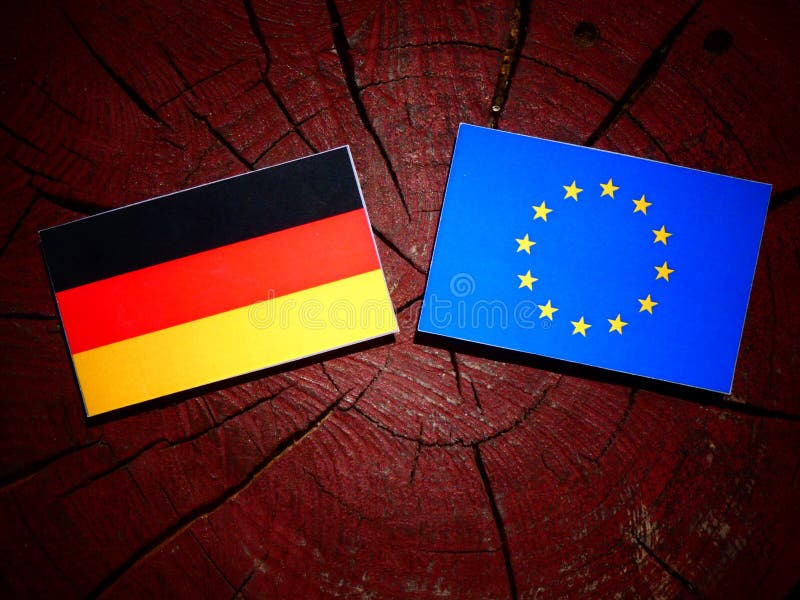 German Flag with EU Flag on a Tree Stump Isolated Stock Photo - Image ...
