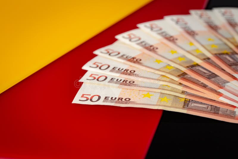 A German Flag with Euro Banknotes / 50 Euro Stock Image - Image of ...