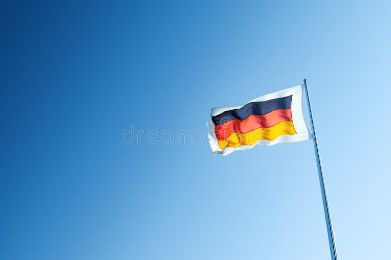German Flag Flying in the Wind Stock Image - Image of yellow, windy ...