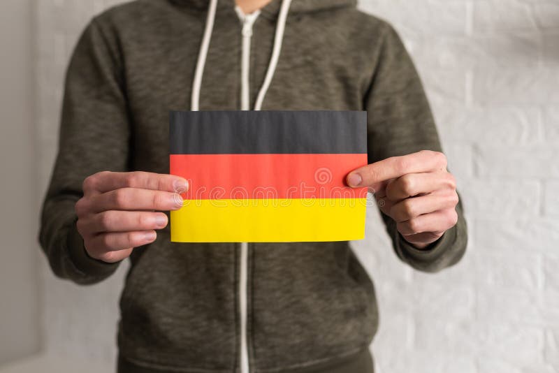 German Flag in Hands. Modern Education, Language Learning and Knowledge ...