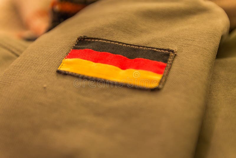German flag on army jacket stock image. Image of official - 104081223