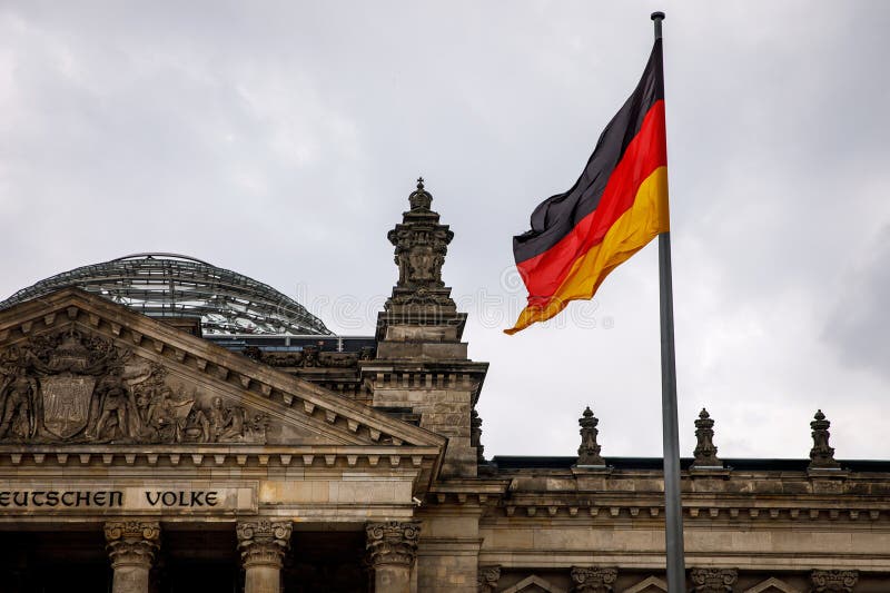 The German Flag Waves at the Bundestag, the Building of the German ...