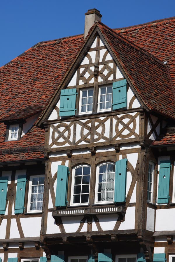 A-Frame House on Water with Boats Stock Image - Image of lake ...