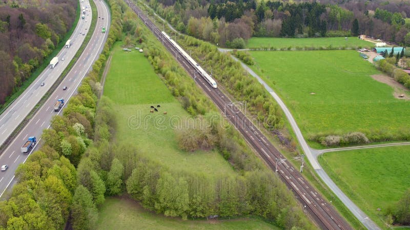 Highspeed Train Passing the Entrance of a Tunnel - Aerial View Stock ...