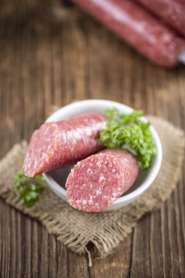 German Mettwurst on Wooden Background Stock Photo - Image of ground ...