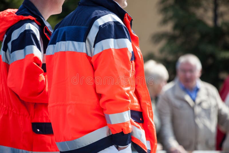 German Paramedics in Red Jackets on a Street Stock Image - Image of ...