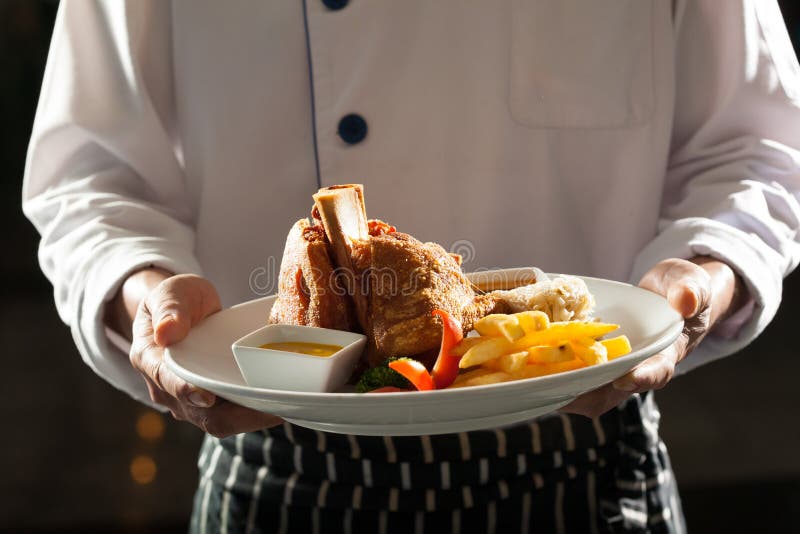 German pork stock photo. Image of hotel, meal, uniform - 39579656