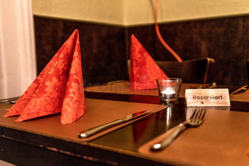 German Reserved Sign Label on the Table of Restaurant in an Germany ...