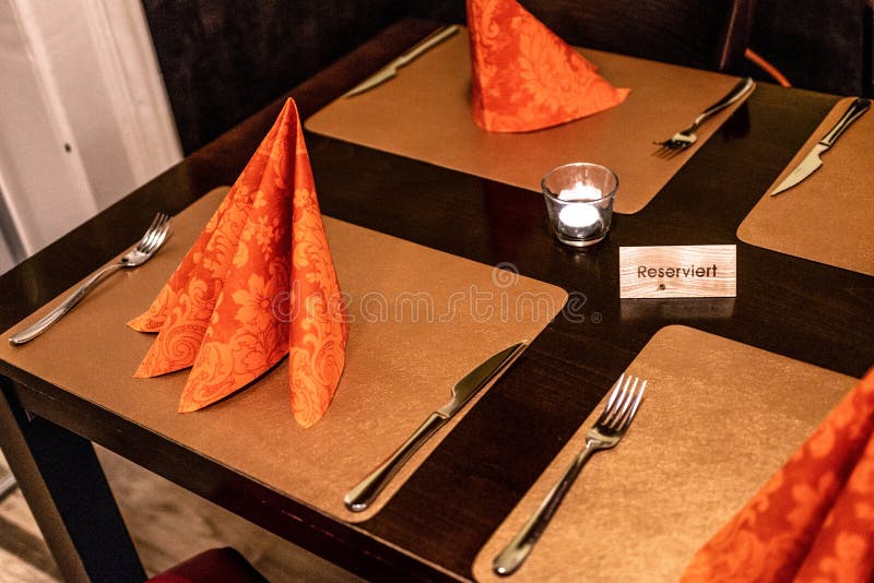 German Reserved Sign Label on the Table of Restaurant in an Germany ...