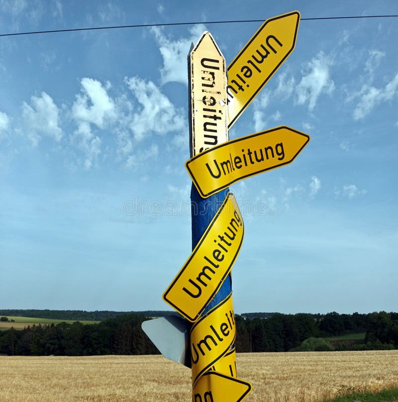 German Signs Umleitung on Post in Front of Blue Sky Editorial Stock ...