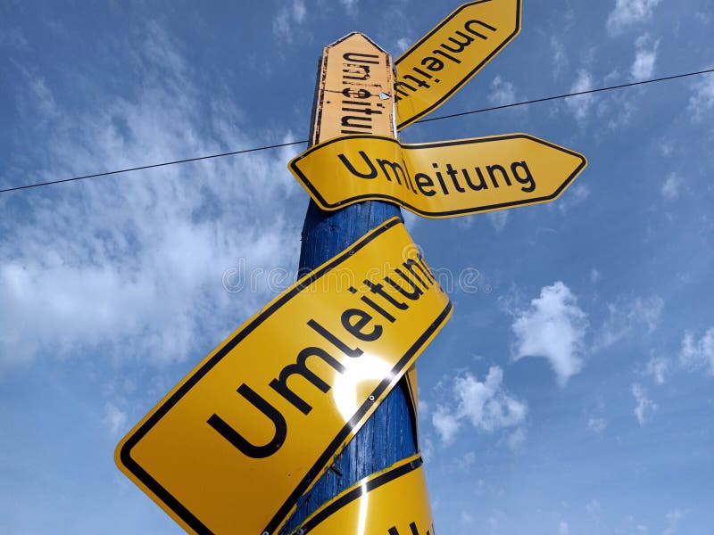German Signs Umleitung on Post in Front of Blue Sky Editorial Stock ...