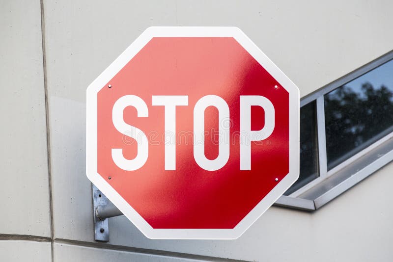 Stop Sign on a Concrete Wall Stock Photo - Image of germany ...