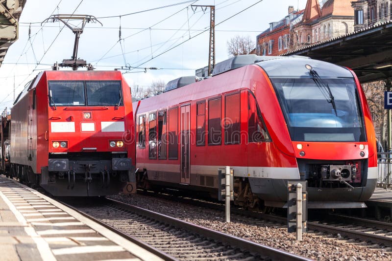 German Train Passes a Train Station Stock Photo - Image of passenger ...