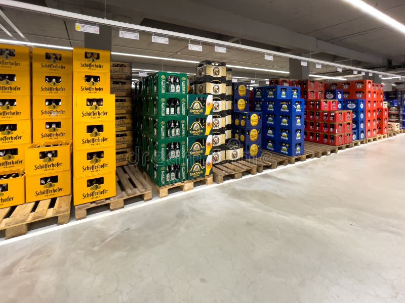 Germany Berlin May 11, 2024. a Row of Beer Boxes are Stacked on Pallets ...
