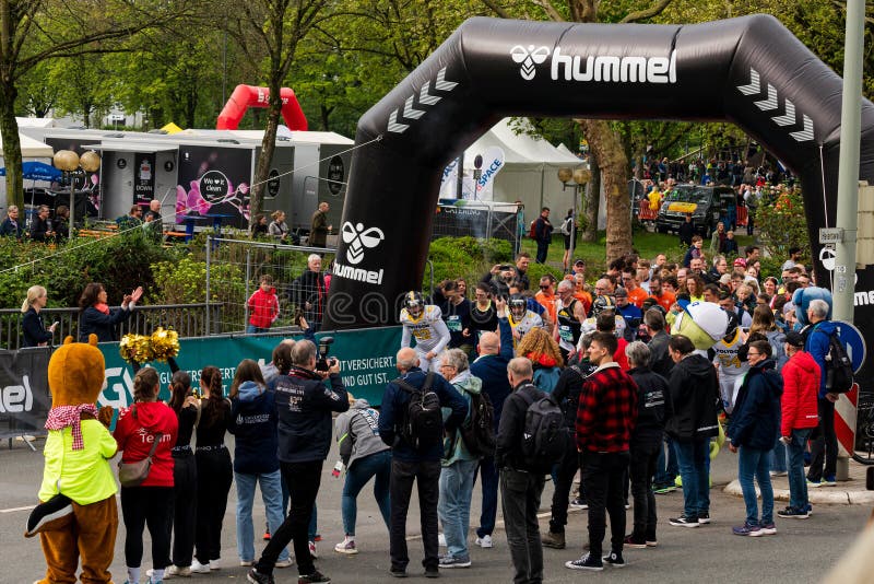 GERMANY, PADERBORN, 04-19-2025. Runners Start Under an Inflatable Arch ...