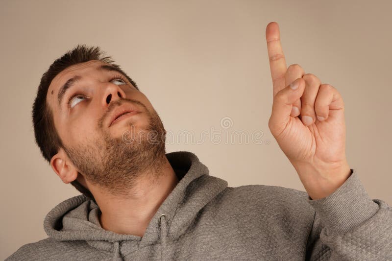 The Gesture Draws Attention and Conveys Urgency. with a Single Raised ...