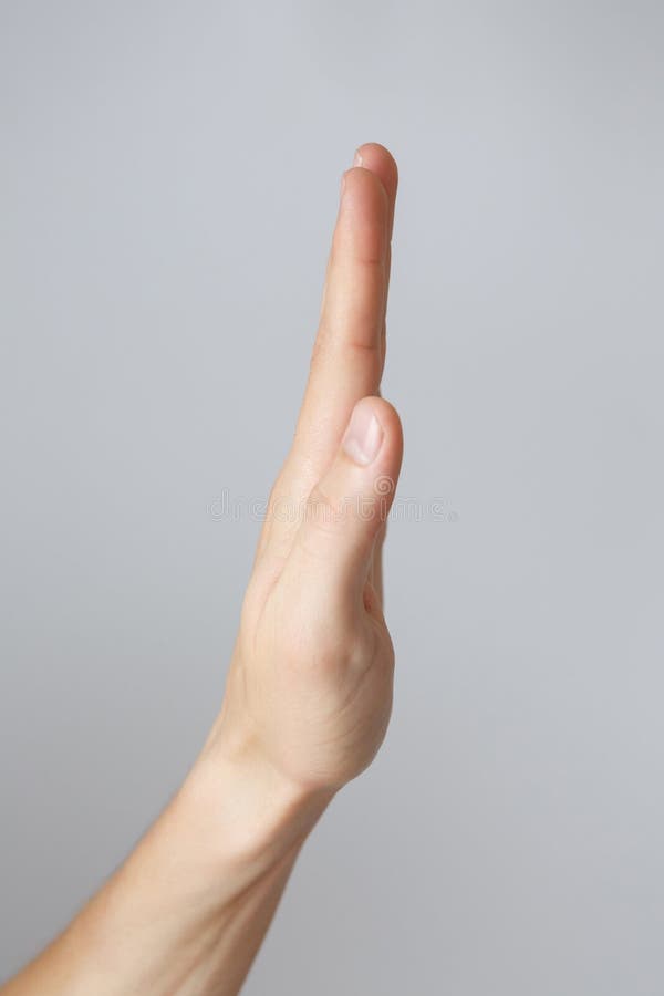 The Hand is Holding or Squeezing Something in between Stock Photo ...