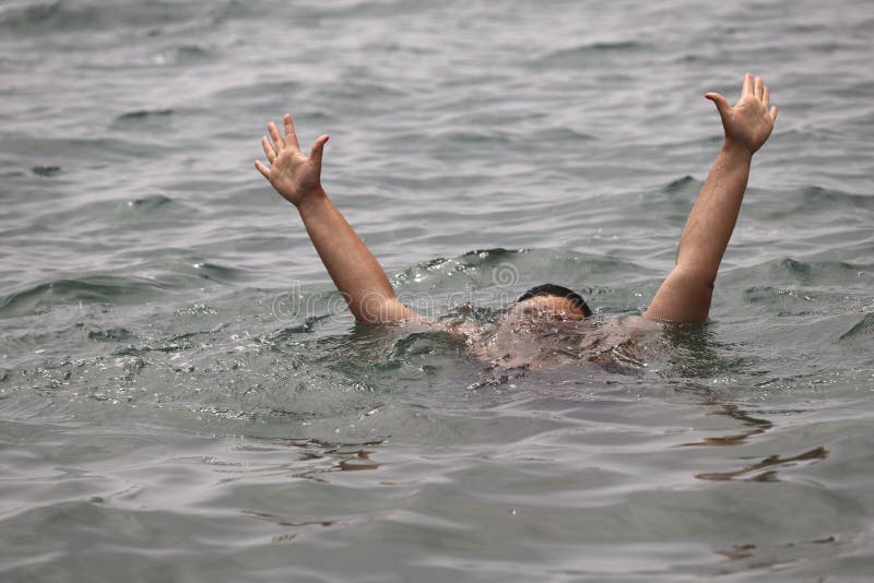 Gestures of a Drowning Man Calling for Help at Sea. Stock Image - Image ...