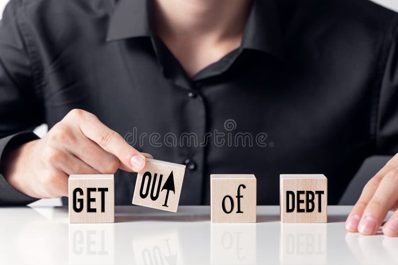 Get Out of Debt Concept, Text on Wooden Blocks, Pay Off Debts Stock ...