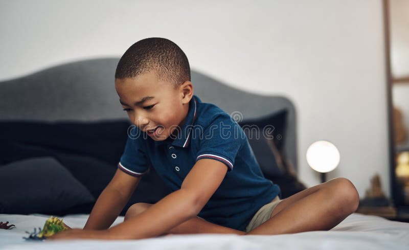 Get Ready for Some Roaring Fun. a Young Boy Playing with Dinosaurs ... Get Ready for Some Roaring Fun. a Young Boy Playing with Dinosaurs ...