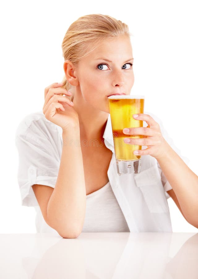 Get Refreshed. Shot of a Young Woman Enjoying a Drink. Stock Image ...