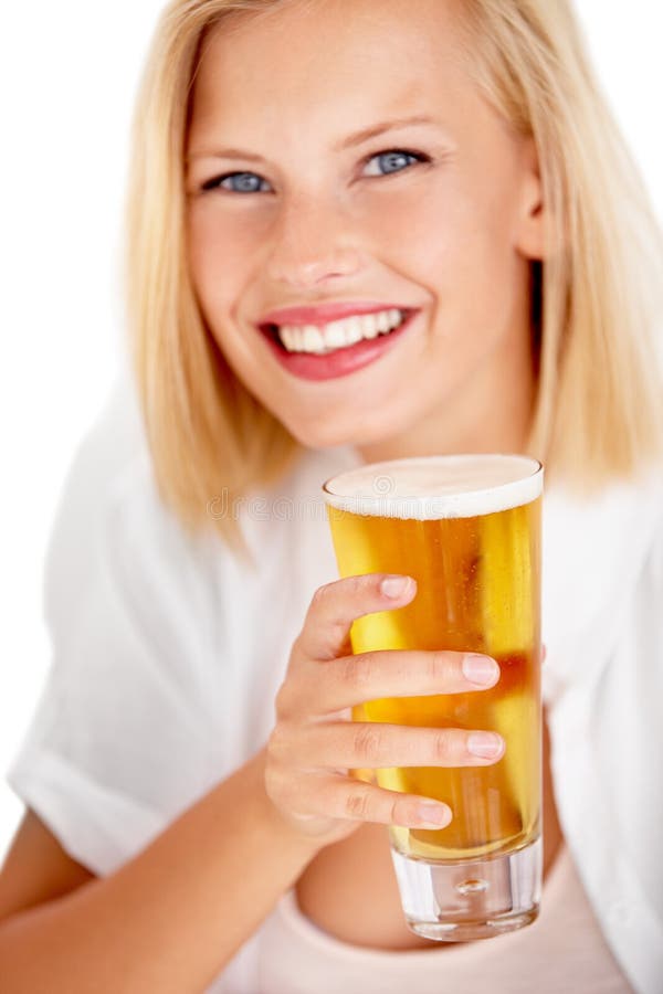 Get Refreshed. Shot of a Young Woman Enjoying a Drink. Stock Photo ...