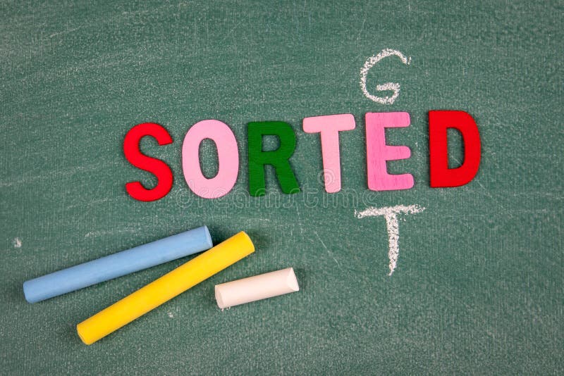 Get Sorted Concept. Words and Colored Pieces of Chalk on a Green Chalk ...