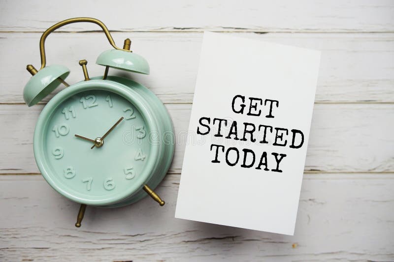 Get Started Today Text Message with Alarm Clock on Wooden Background ... Get Started Today Text Message with Alarm Clock on Wooden Background ...