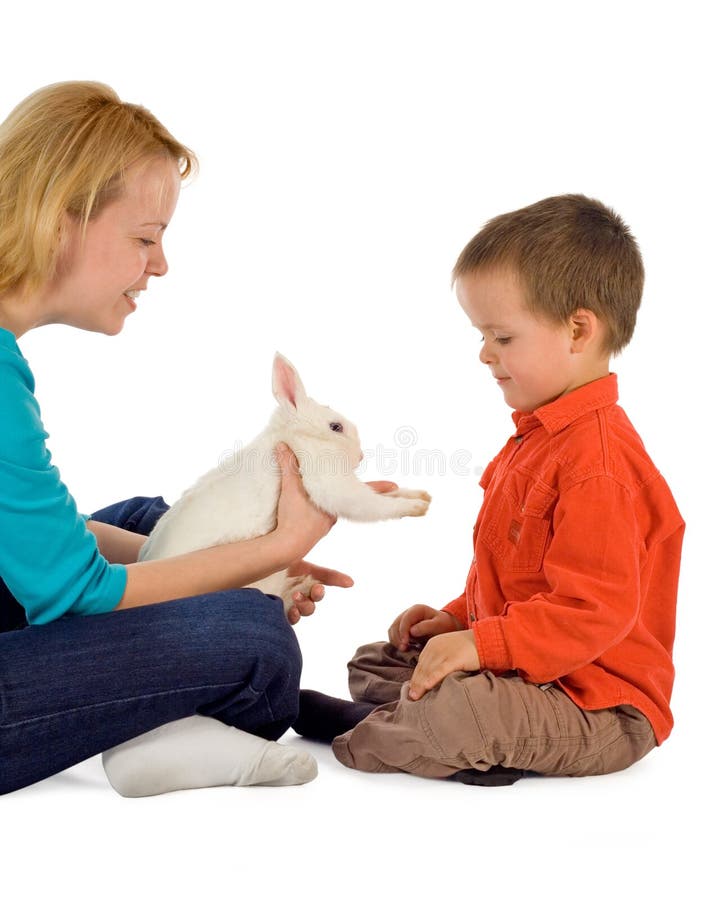 Getting Acquainted with a Bunny Stock Image - Image of play, happy: 2113385