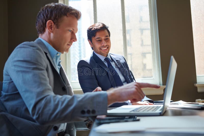 Getting the Basics of Their Plan in Order. Businessmen Working in Their ...