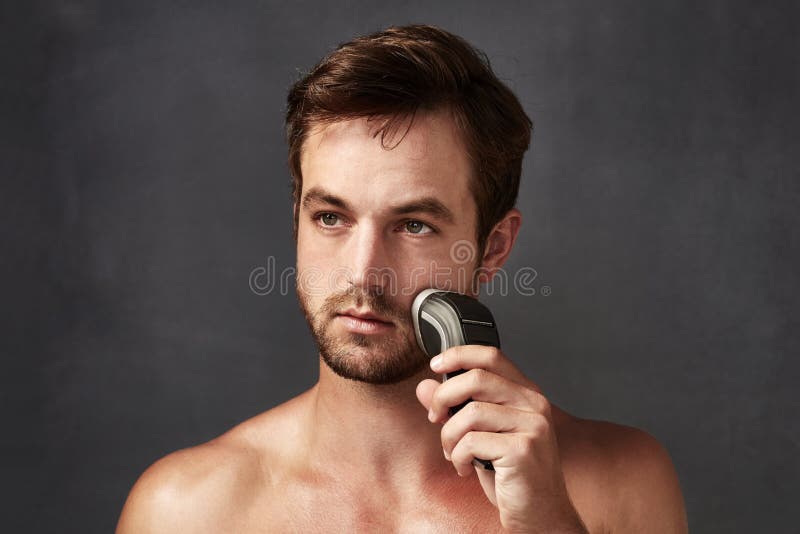 Getting Bored of the Same Old Routine. Cropped Portrait of a Handsome ...