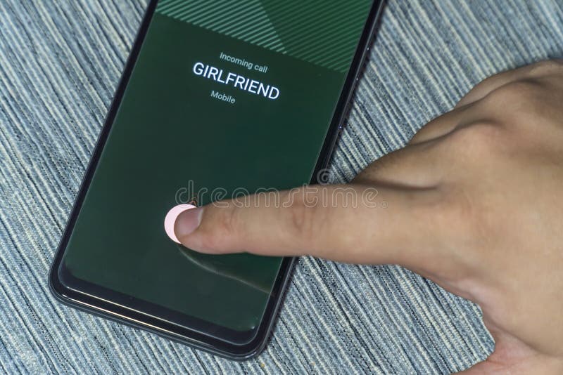 Getting a Call from the Girlfriend on a Mobile Phone Stock Photo ...