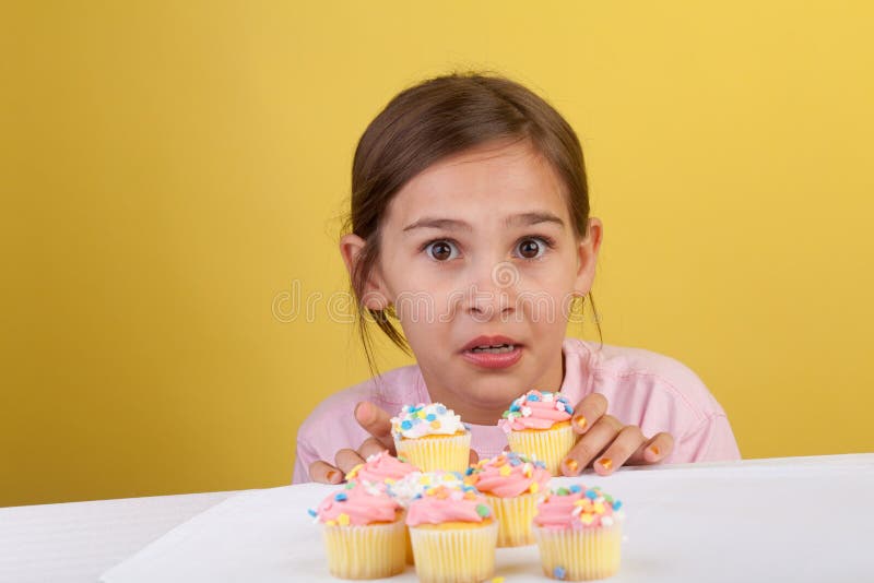 Getting Caught Stealing Cupcakes Stock Image - Image of brunette ...