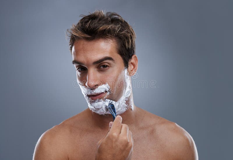 Getting the Closest Shave Ever. Head and Shoulders Studio Shot of a ...