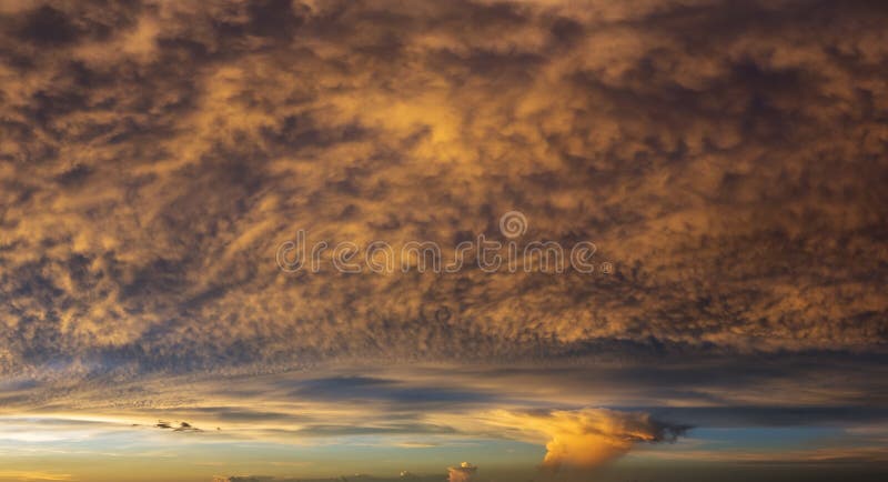 Getting Dark at Sundown. Sunset Sky with Scattered Clouds of Bright ...