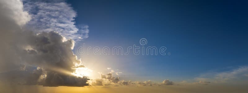 Getting Dark at Sundown. Sunset Sky with Scattered Clouds of Bright ...