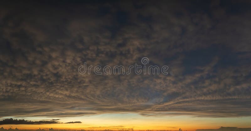 Getting Dark at Sundown. Sunset Sky with Scattered Clouds of Bright ...