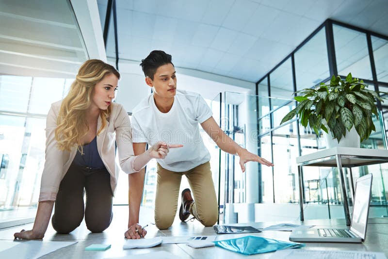 Getting Down To Some Good Old Brainstorming. Shot of Two Colleagues ...