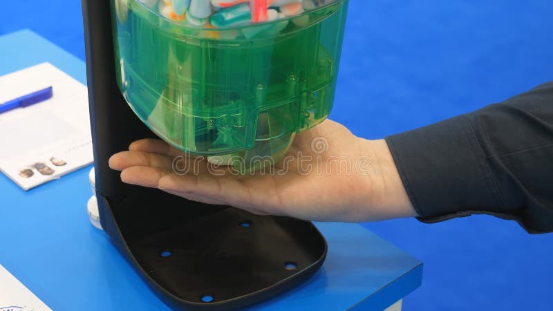 Taking Earplugs from Ear Plug Dispenser Stock Video - Video of ...