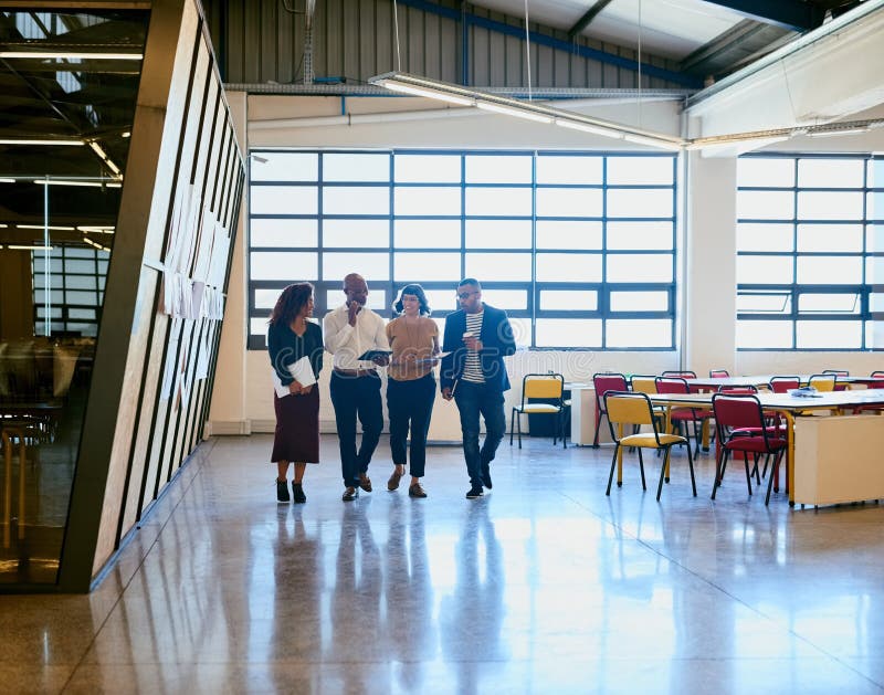 Getting Everyone on Board. a Group of Designers Having a Discussion ...