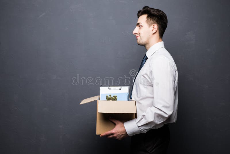 Getting Fired. Side View of Handsome Businessman in Formal Wear Holding ...