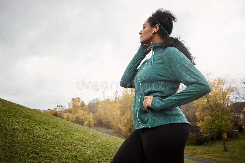 Getting in the Fit Frame of Mind. an Attractive Young Woman Taking a ...
