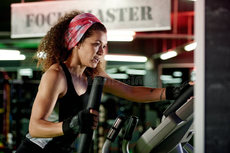 Getting Fit One Step at a Time. a Young Woman Working Out with a ...