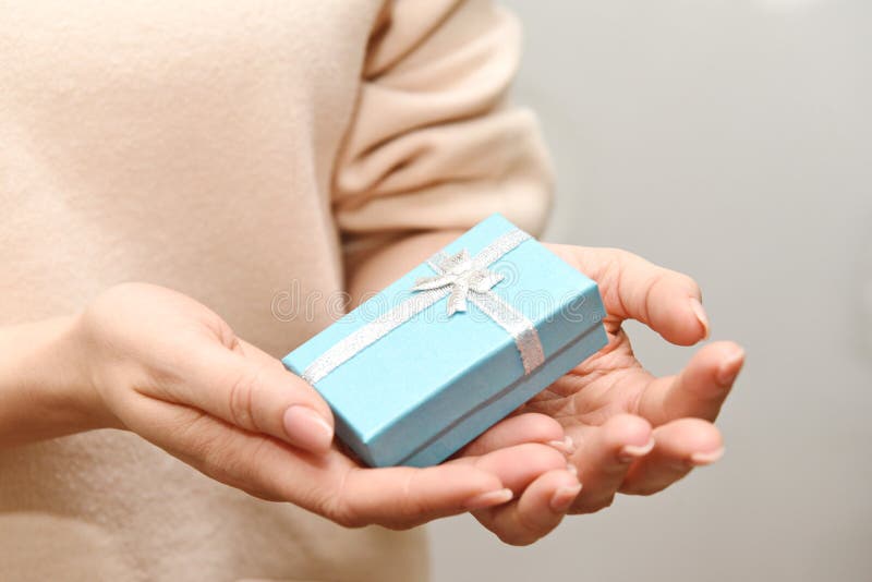 Getting a Gift for a Holiday Paper Box Stock Photo - Image of container ...