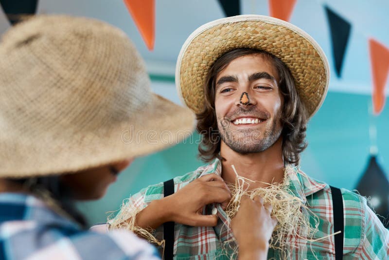 Getting Halloween Ready. a Young Couple Getting Dressed for Halloween ...