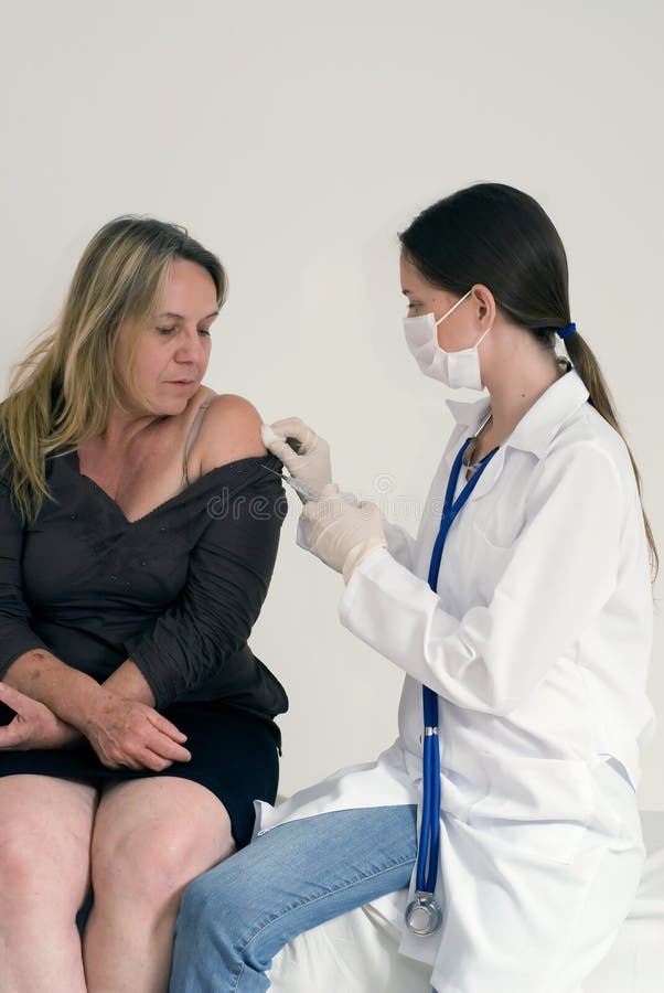 Getting an Injection stock photo. Image of women, medical - 5035320