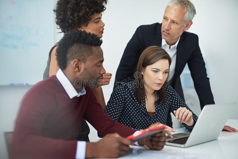 Getting the Job Done with Teamwork. a Group of Businesspeople ...