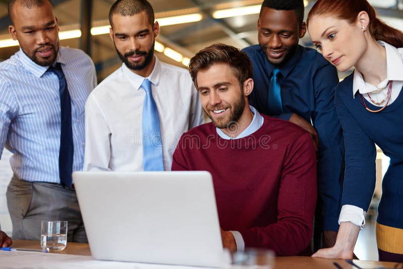 Getting the Job Done through Teamwork. a Group of Businesspeople ...