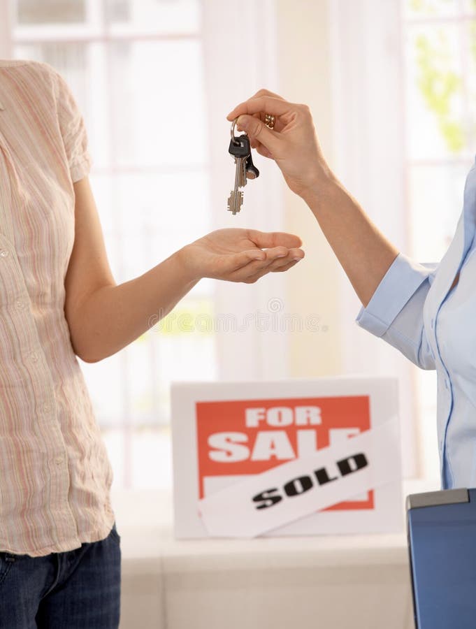 Getting keys to new house stock photo. Image of sell - 17724892